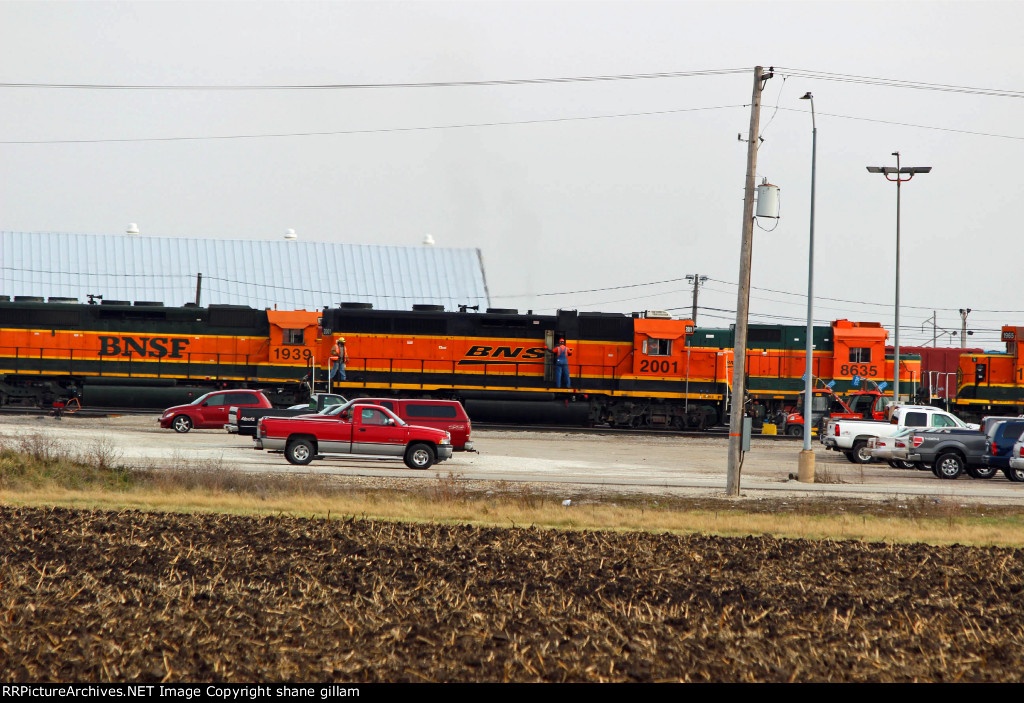 BNSF 1939 sits behind the bnsf 2001 getting fired up.
